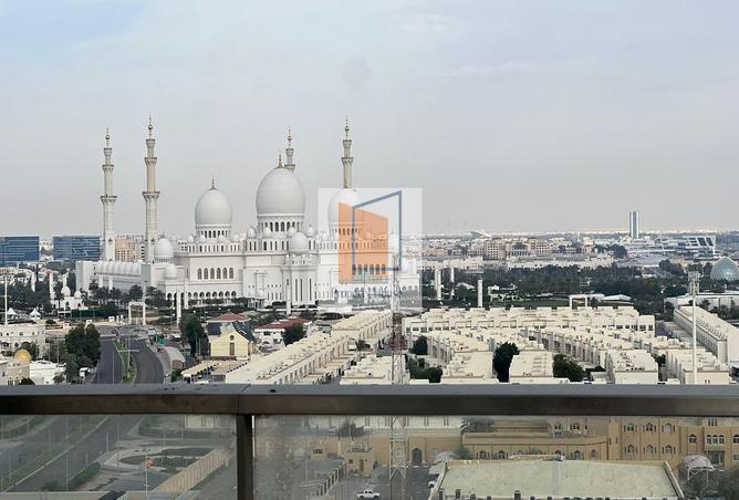 Rent in Rihan Heights: Well Priced l Balcony & Grand Mosque View ...