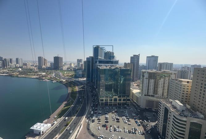 للايجار في برج أمير بو خمسين: 2BHK with Lake and Qasba View in Al Majaz ...