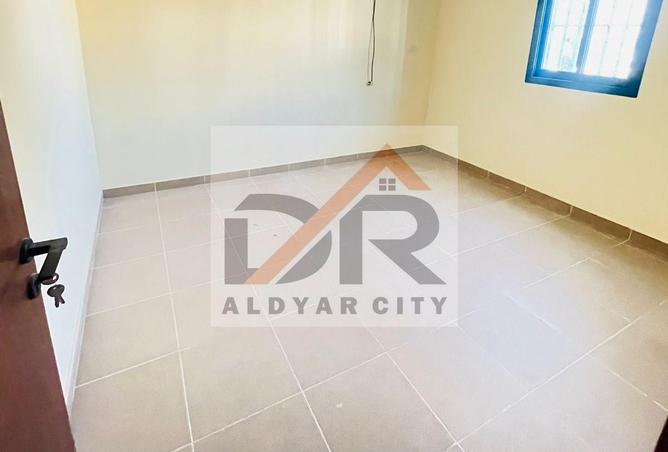 Rent in Al Rumailah building: Al Karama Ajman room and hall renovated ...