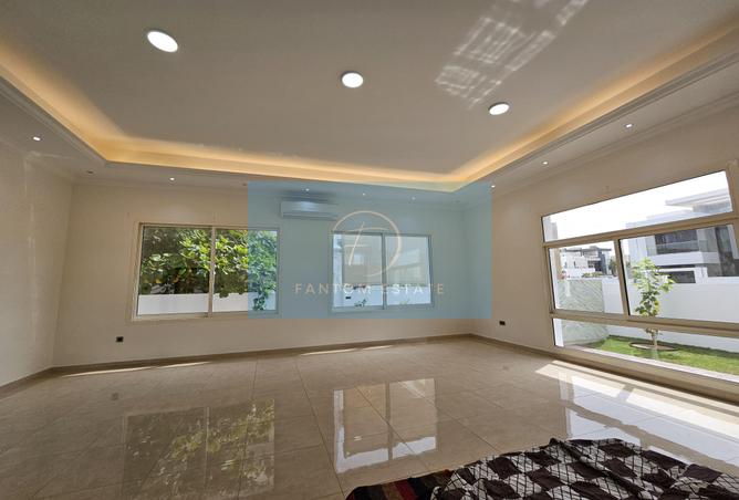 Rent in Al Khail Gate: Spacious 4BR | Garden | Maids room | Property Finder