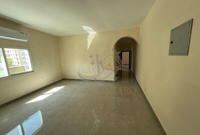 Rent in Al Rumailah building: Two-bedroom apartment with a living room ...